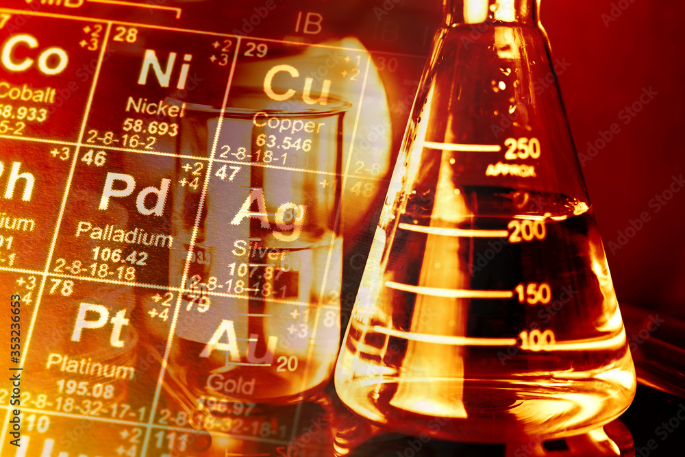 Laboratory glassware and periodic table of elements. Science concept ...