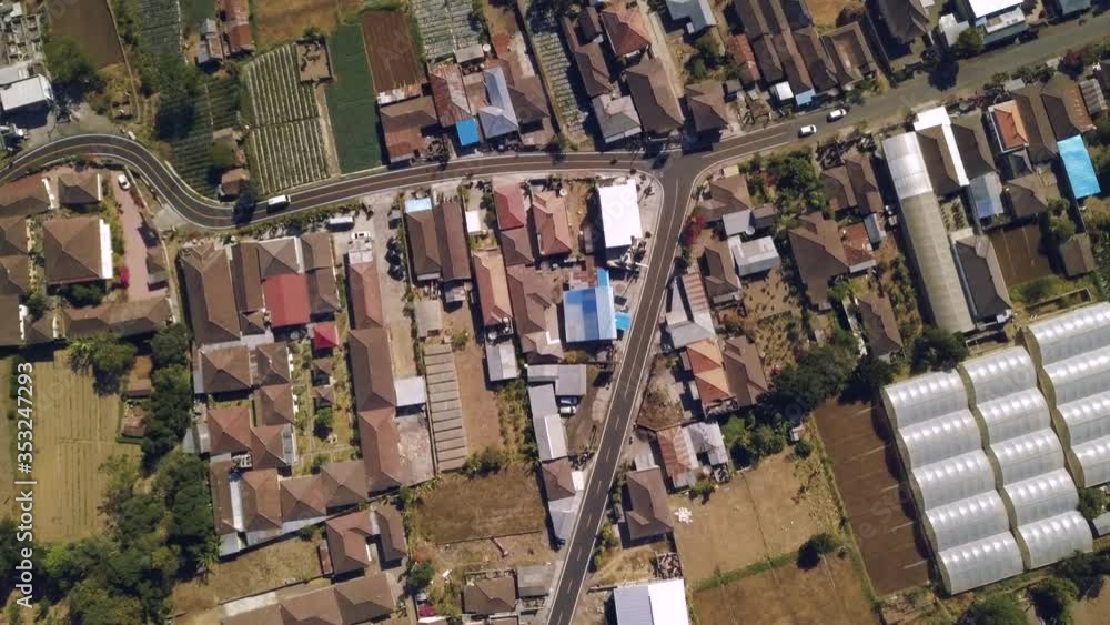 Aerial top down view of a small town in the countryside with Y ...