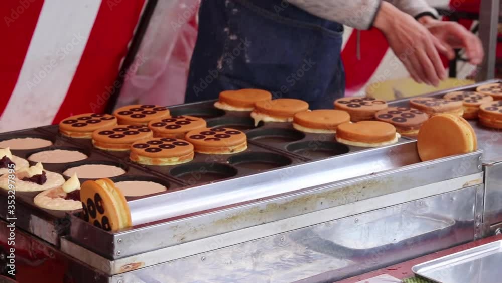 Street Food Vendor At Japan Market Stall Cooks Traditional Imagawayaki ...