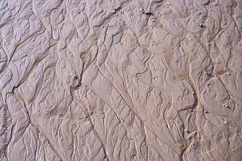 Sand erosion by tidal ranges make line and curve on beach Stock Photo ...