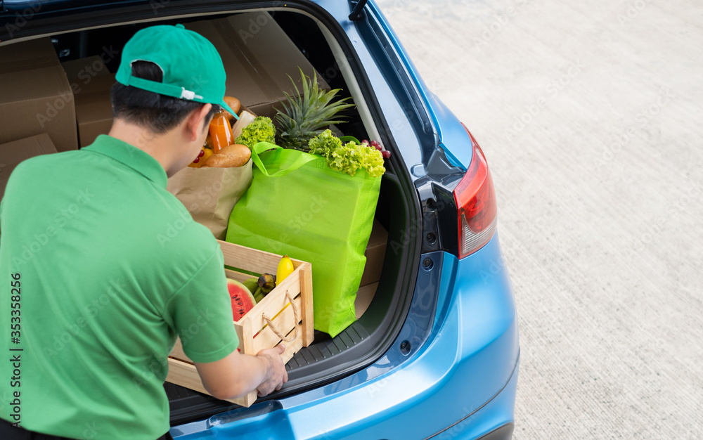 Food Delivery man giving fruit and vegetable shopping supermarket to ...