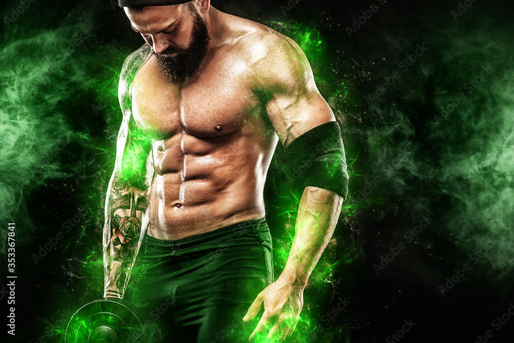 Athlete in green energy lights. Muscular young fitness sports man ...