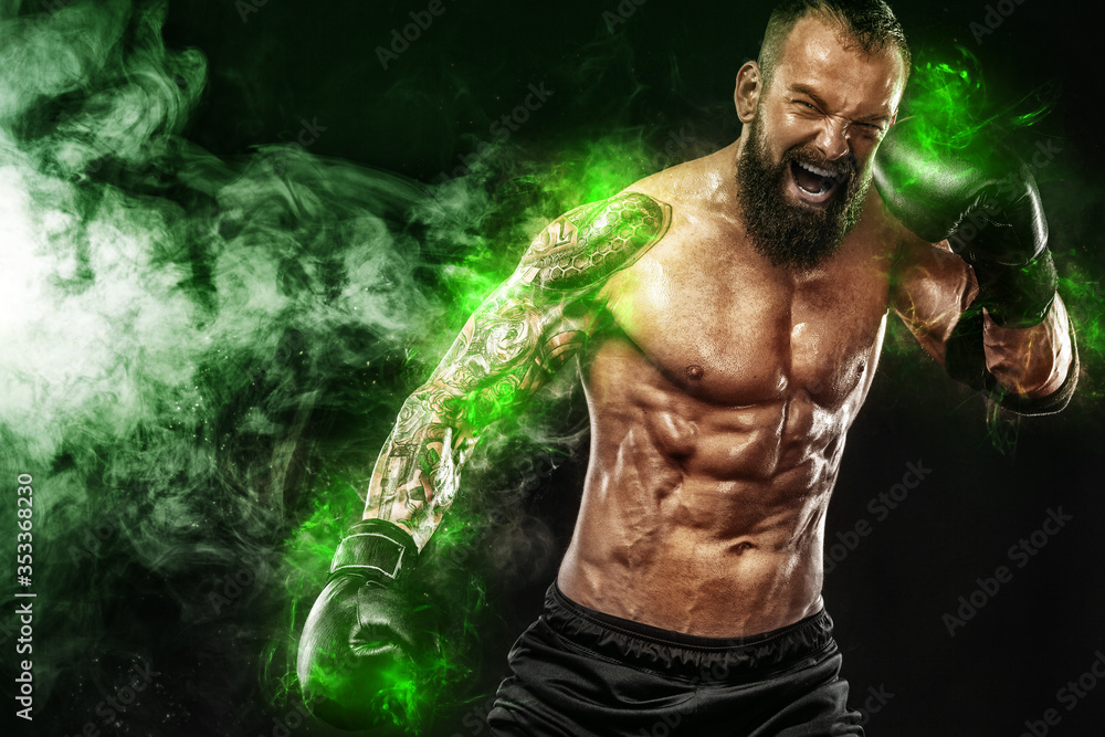 Athlete in green energy lights. Sportsman muay thai boxer fighting on ...