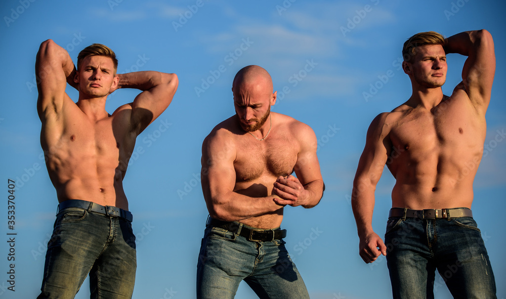 Group muscular men outdoors. Athletic bodybuilders. Sport concept ...