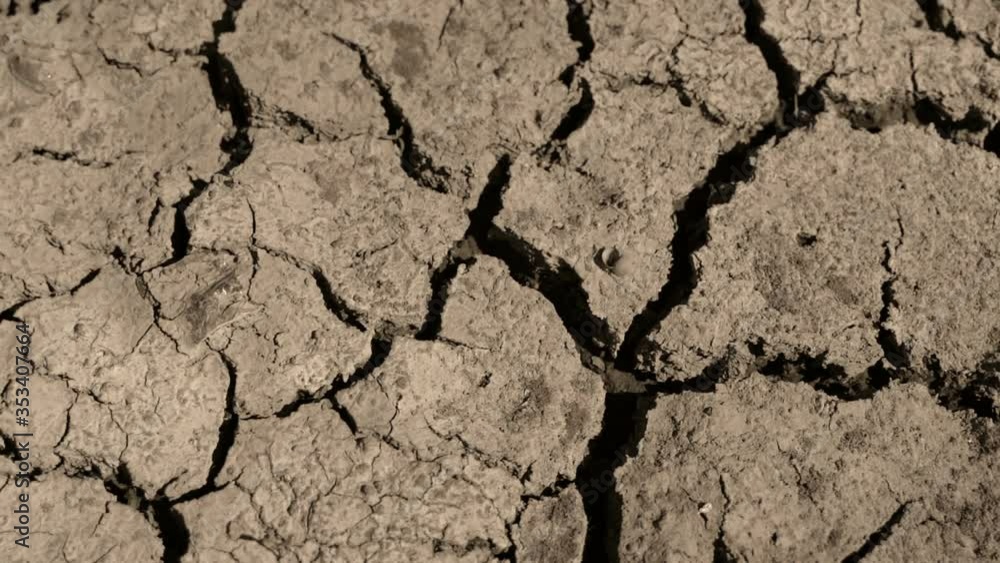 Drought cracked soils, dry crack lakes, drought soil at the bottom of ...