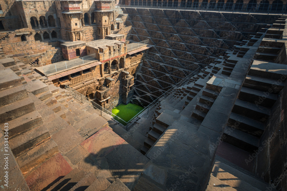 .Perspective stone stairs of the famous and deepest Chand Baori Step ...