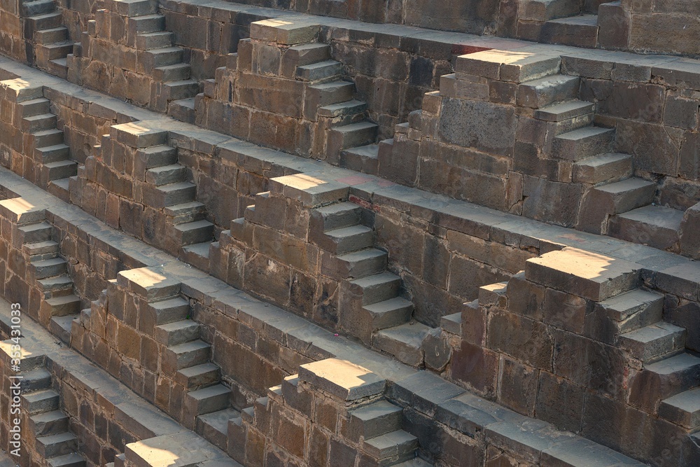 .Perspective background of stone stairs of Chand Baori Step Well in ...