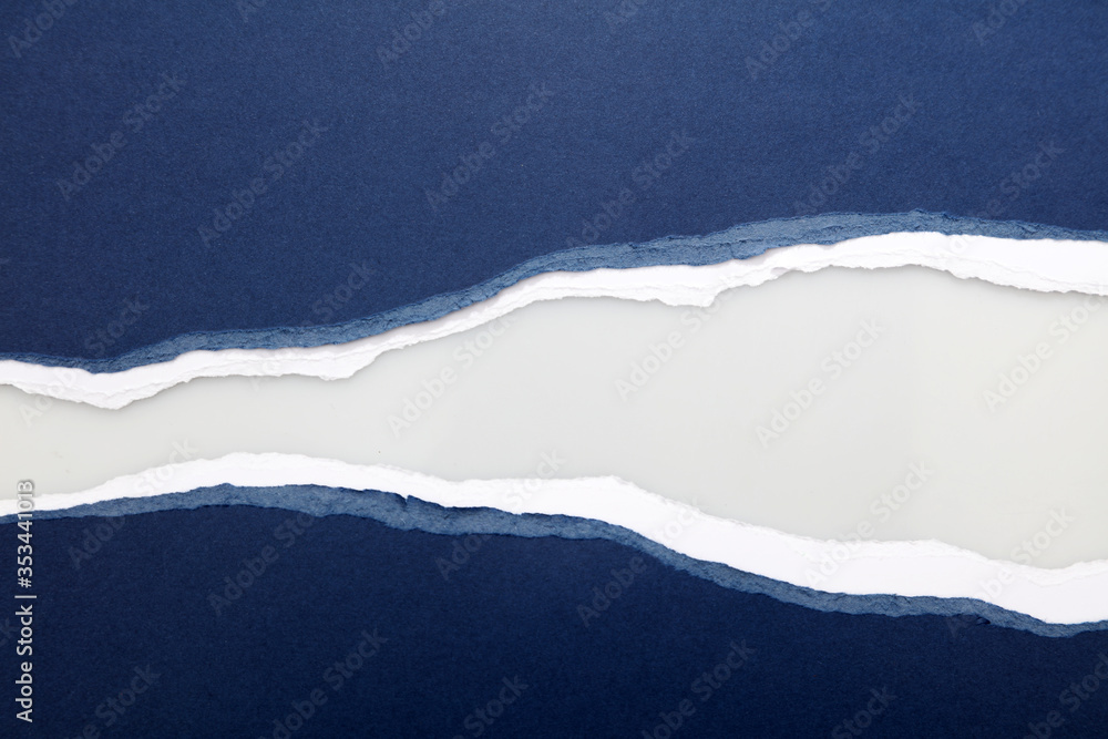 Gap in ripped blue paper on white background. Copy space Stock Photo ...
