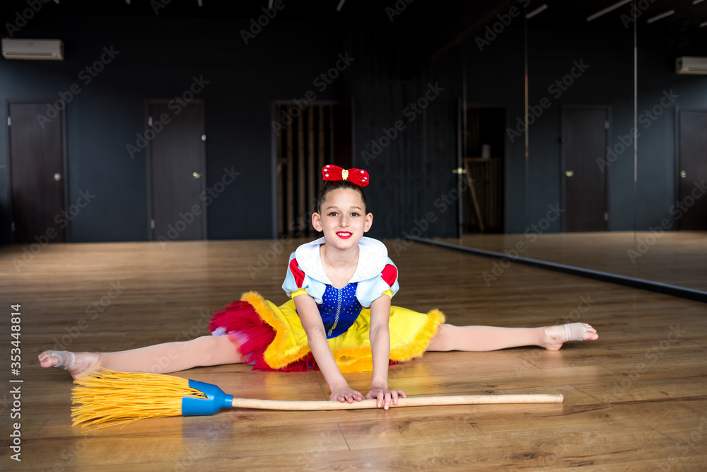 Girl dancing the dance of snow white. Dance number. Acrobatic stunts ...