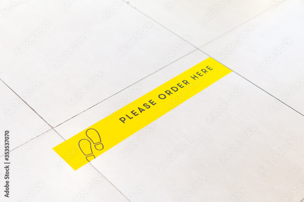 Footprint sign queue for stand in the restaurant.Please order here word ...
