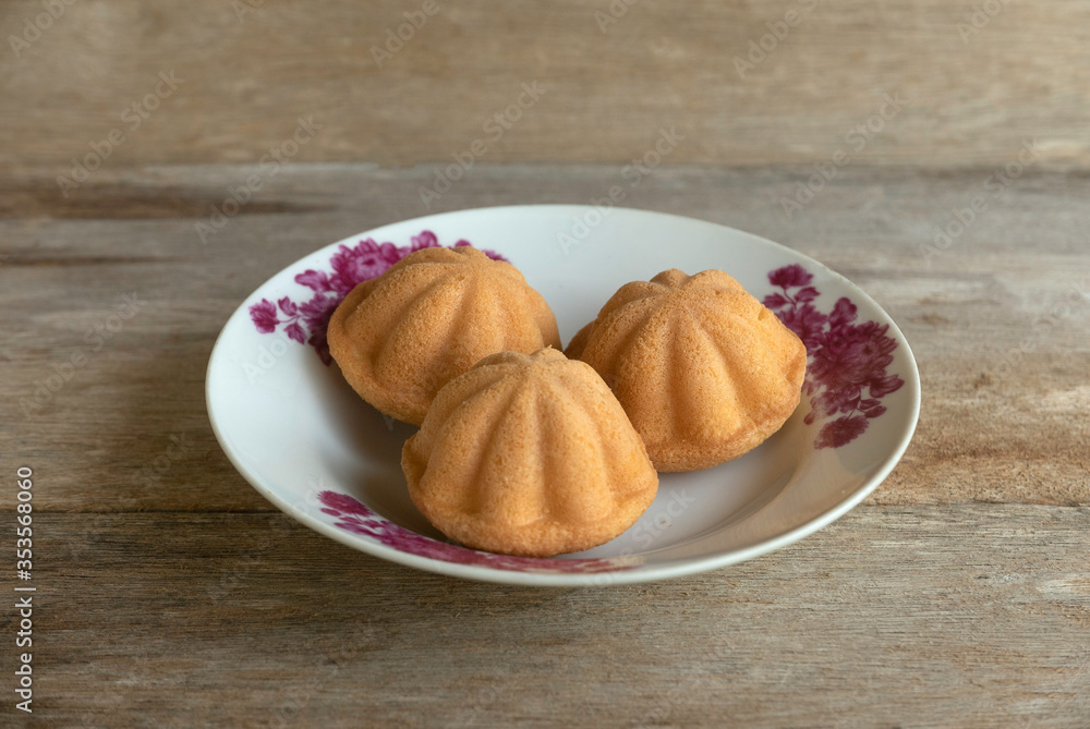 Selective focus of sponge cake or Kuih Bahulu. A traditional food ...