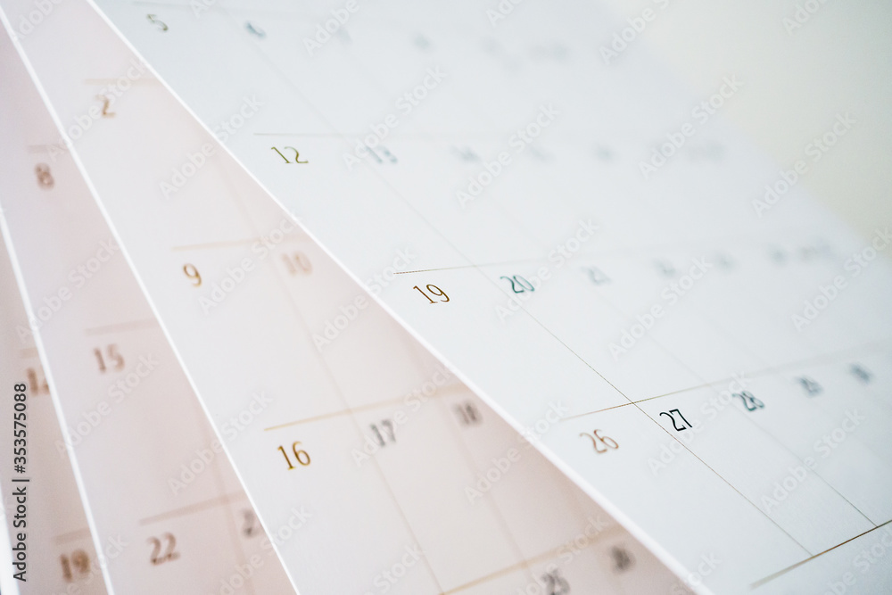 Calendar page flipping sheet close up blur background business schedule ...