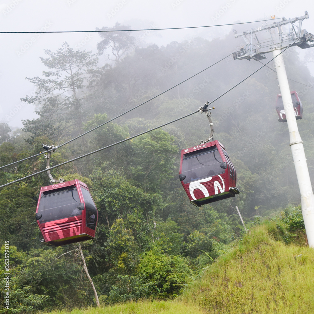 In a ropeway cable car going up from kualampur to genting highlands ...