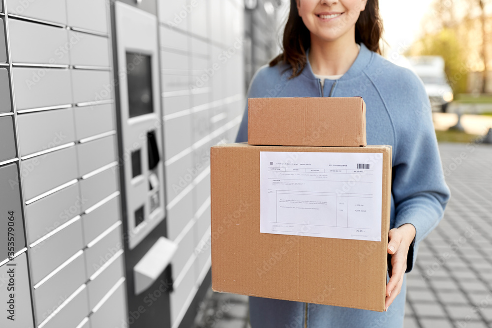 mail delivery and post service concept - close up of happy smiling ...