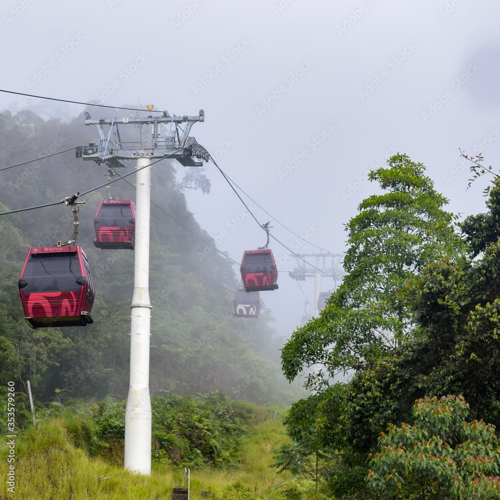 In a ropeway cable car going up from kualampur to genting highlands ...