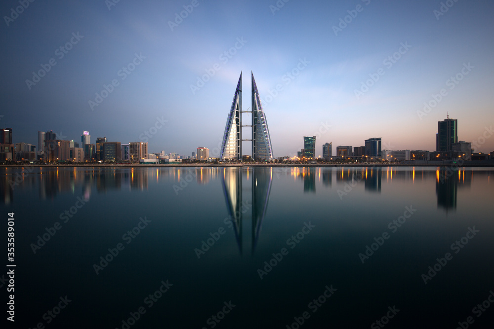 The Bahrain World Trade Center during dusk, a twin tower complex is the ...