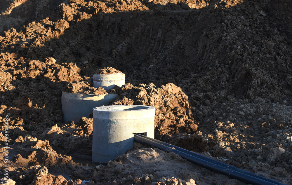 Laying concrete manholes and heating drain pipes and for stormwater ...