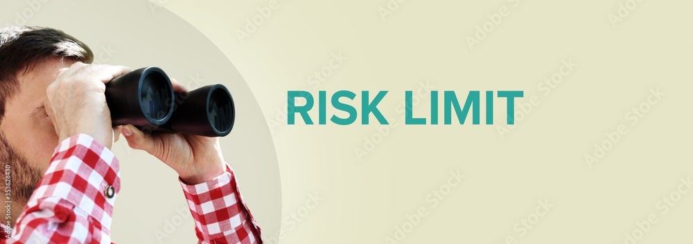 Risk Limit. Businessman (man) looks through binoculars. Focus on text ...