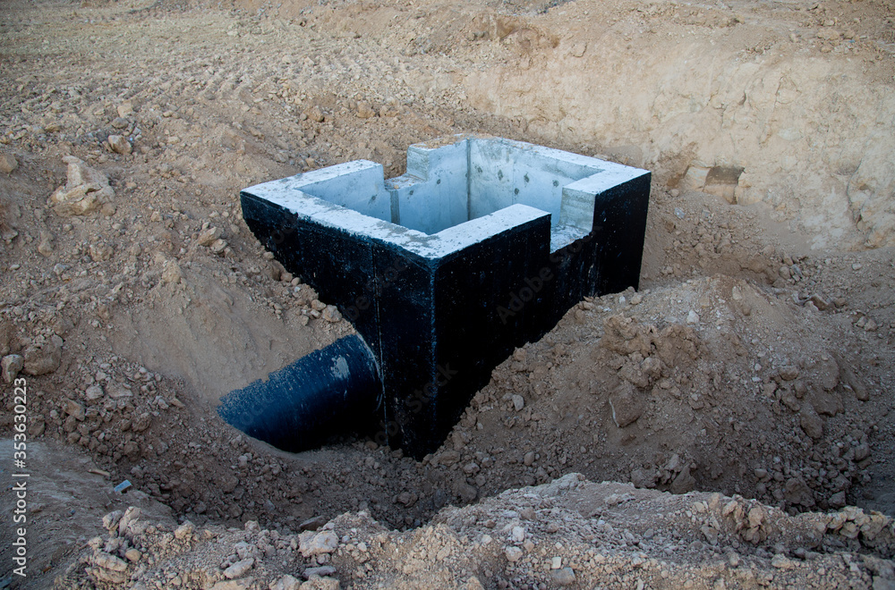 Construction of manhole, stormwater pits, sanitary sewer system ...