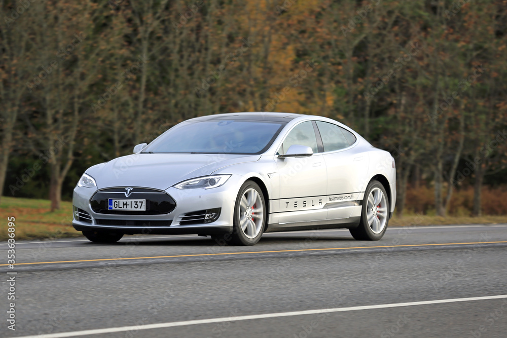 Silver Tesla Electric Car On the Road. Illustrative Editorial Content ...