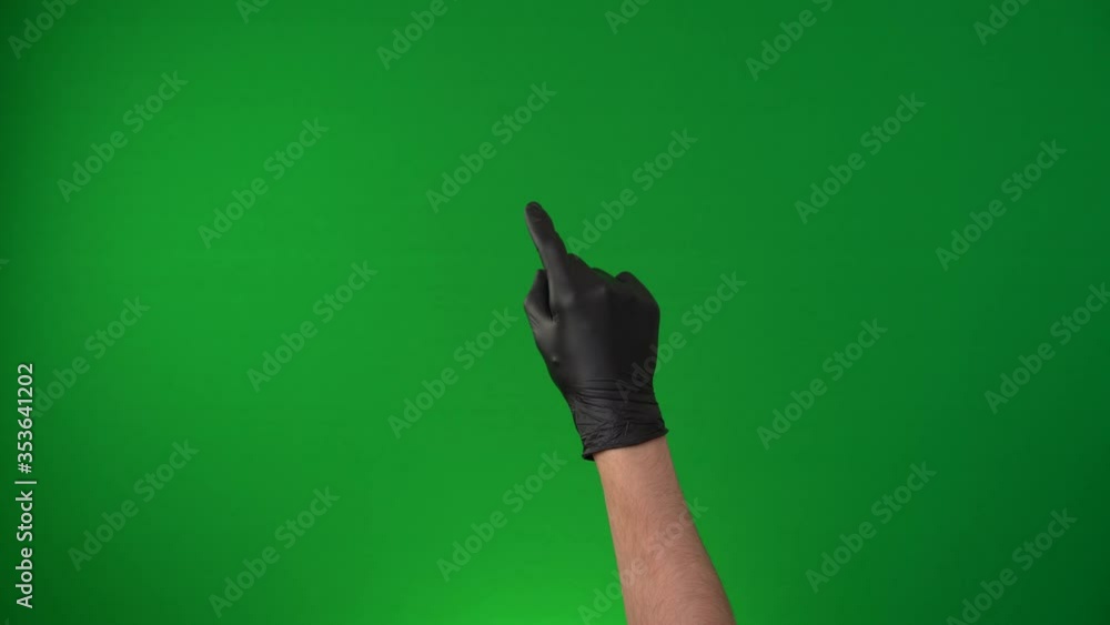 Male hand in a medical glove touching, clicking, tapping, sliding ...