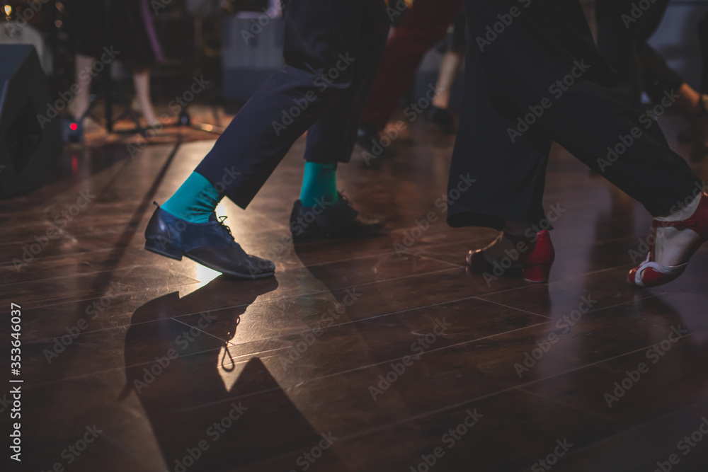 Dancing shoes of young couple dance retro jazz swing dances on a ...