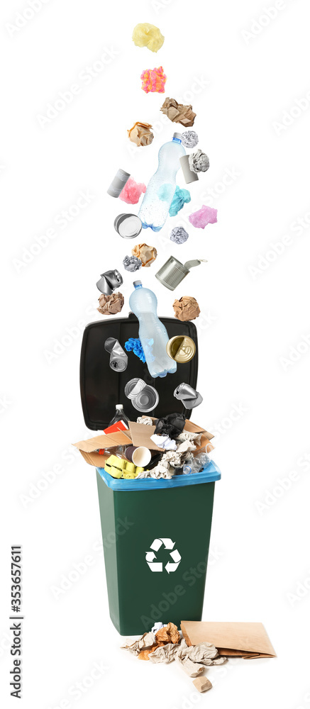 Different garbage falling into trash bin. Waste management and ...