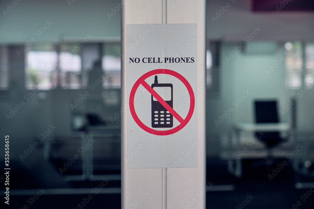 No cell phones sign in the office. Stock Photo | Adobe Stock