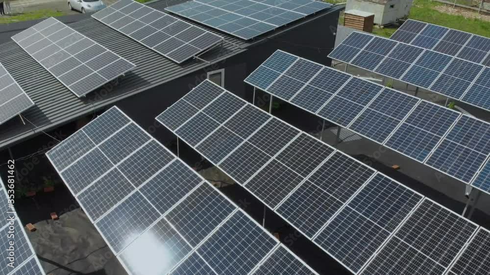 4k Solar panels stands in row on the ground from drone. Free ...
