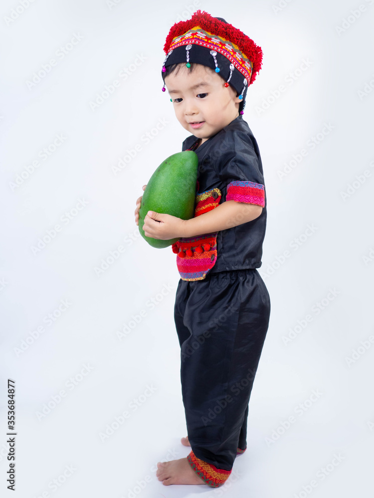 Hmong children little boy wearing traditional dress Holding mango on ...