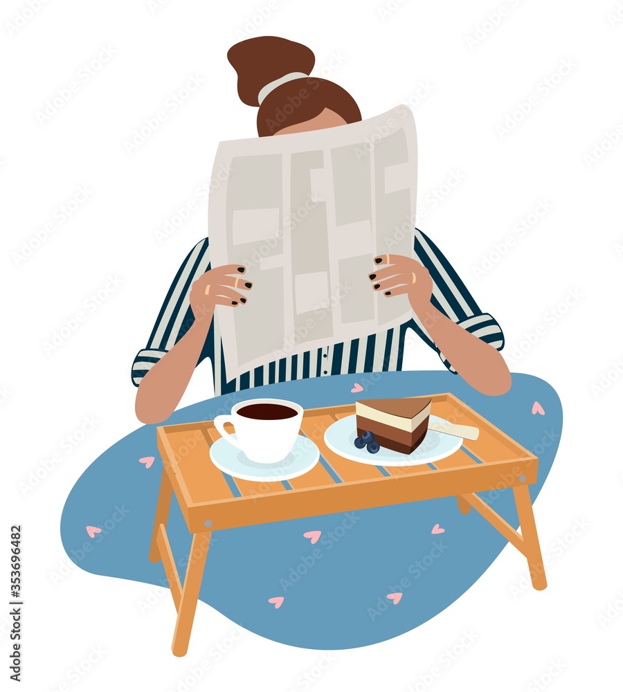Young woman having a breakfast in bed and reading newspaper. Trendy ...