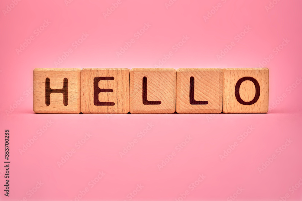 Hello word made with building blocks, business concept. Text Hello on ...
