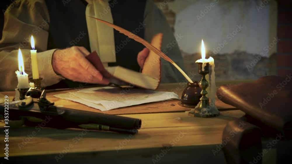 Scene from the 18th century of a man using a feather quill pen to write ...
