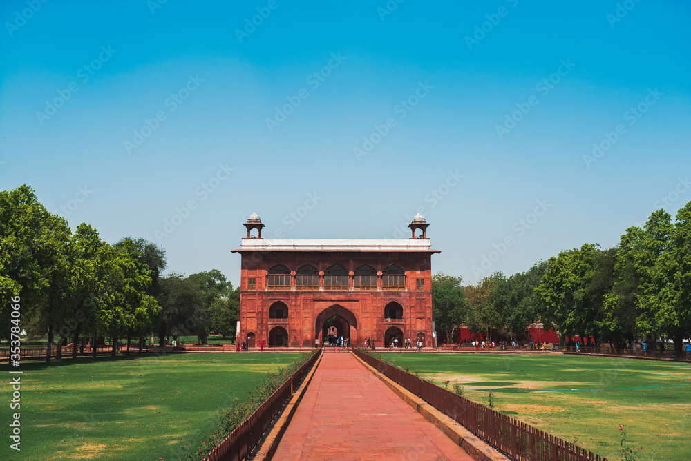 Gardens inside the Red fort in Delhi with a sandstone palace in the ...