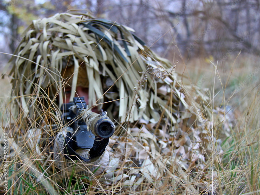 Military man armed sniper rifle gun in combat position. Armed man in ...