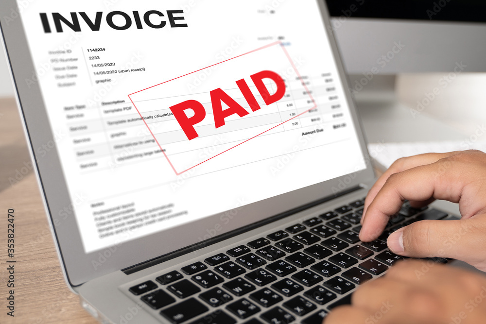 Businessman work Using The Computer Calculating Invoice In Office ...