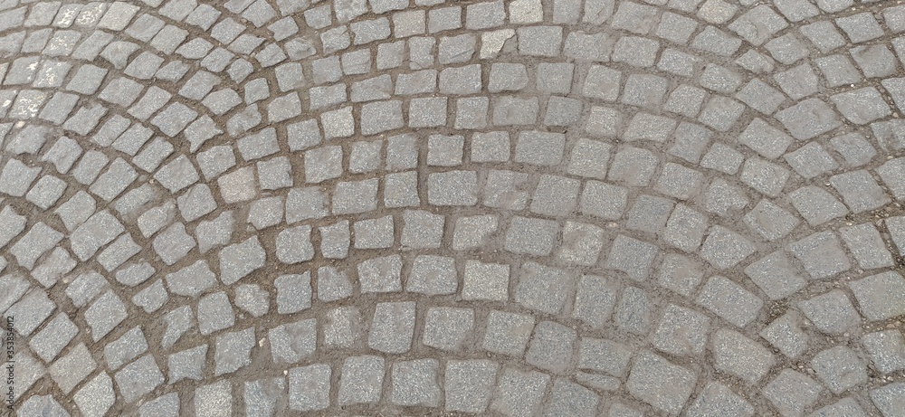 Cobblestone square in the old quarter of the city. Square and uneven ...
