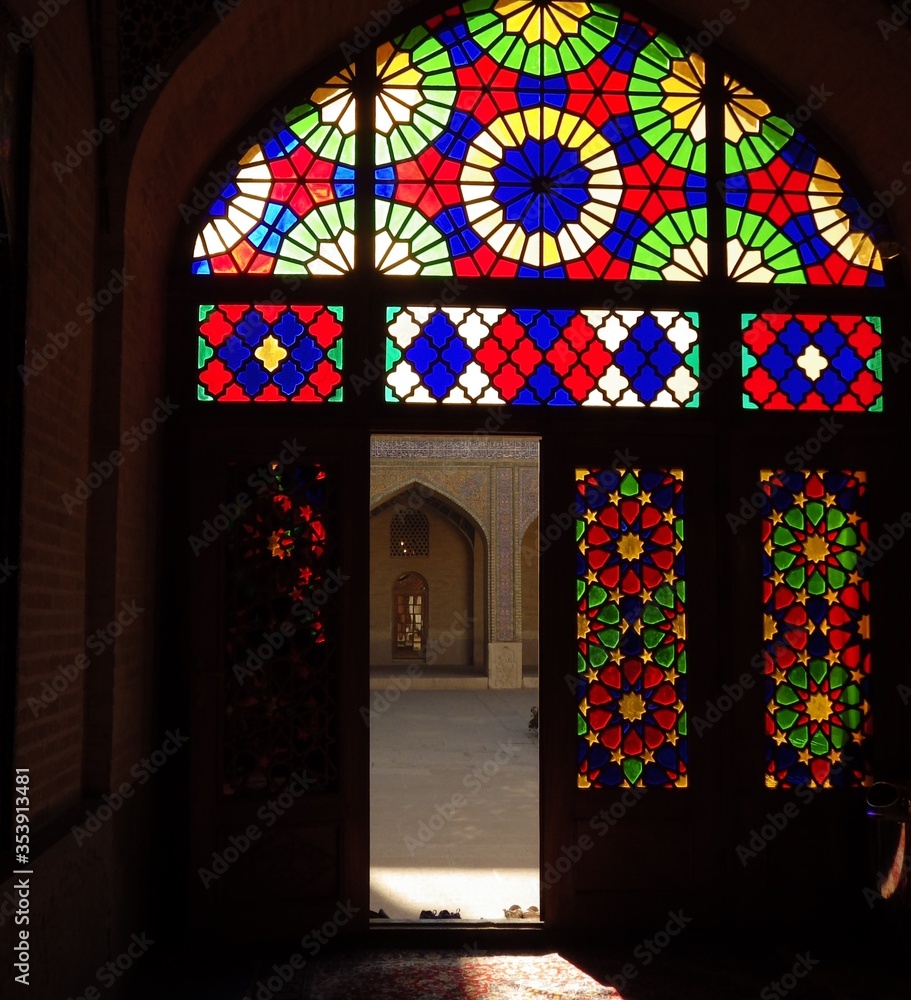 The colourful stained glass with window arch frame at nasir al mulk ...