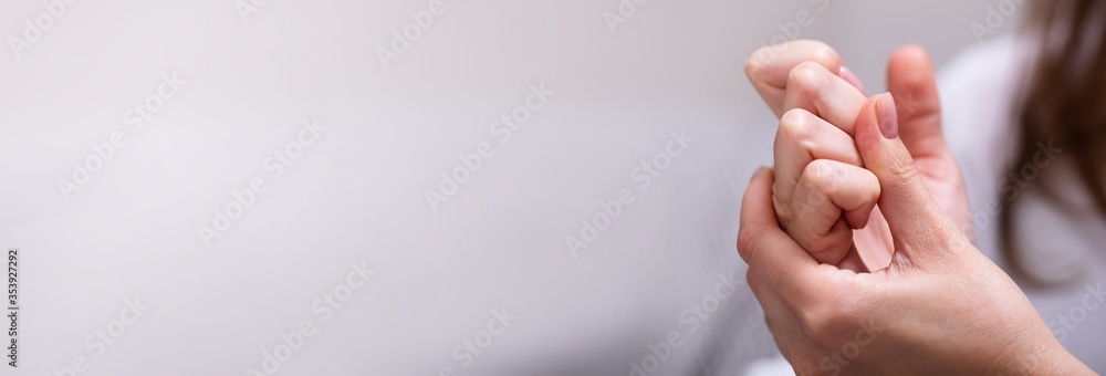 Woman Cracking Their Knuckles Stock Photo | Adobe Stock