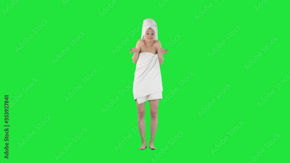 Young woman wrapped in towel after bath apologize and excusing after ...