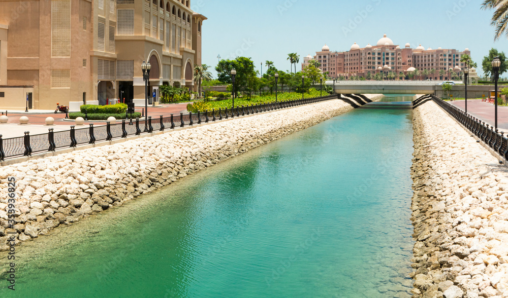 Doha, Qatar. Year 2019: Water channel at The Pearl of Qatar. Turquoise ...