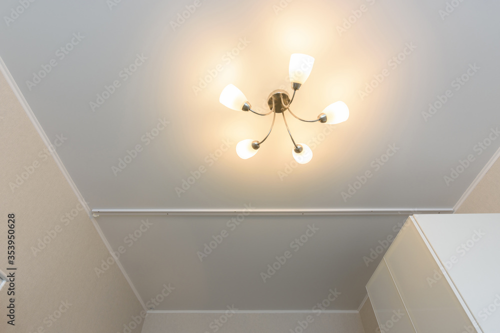 Classic matte stretch ceiling divided into two parts of the guide for ...