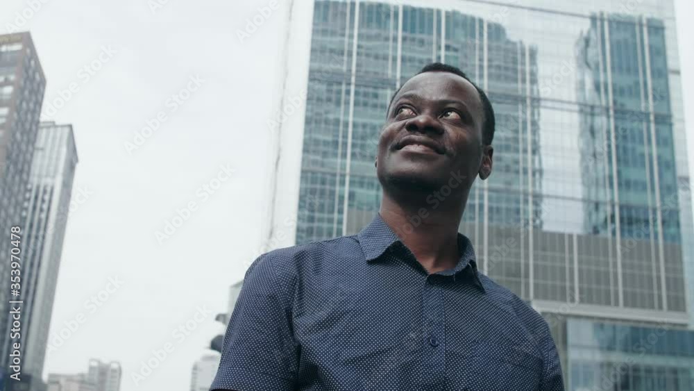 One black man take off his mask looking up to the sky smile happy man ...