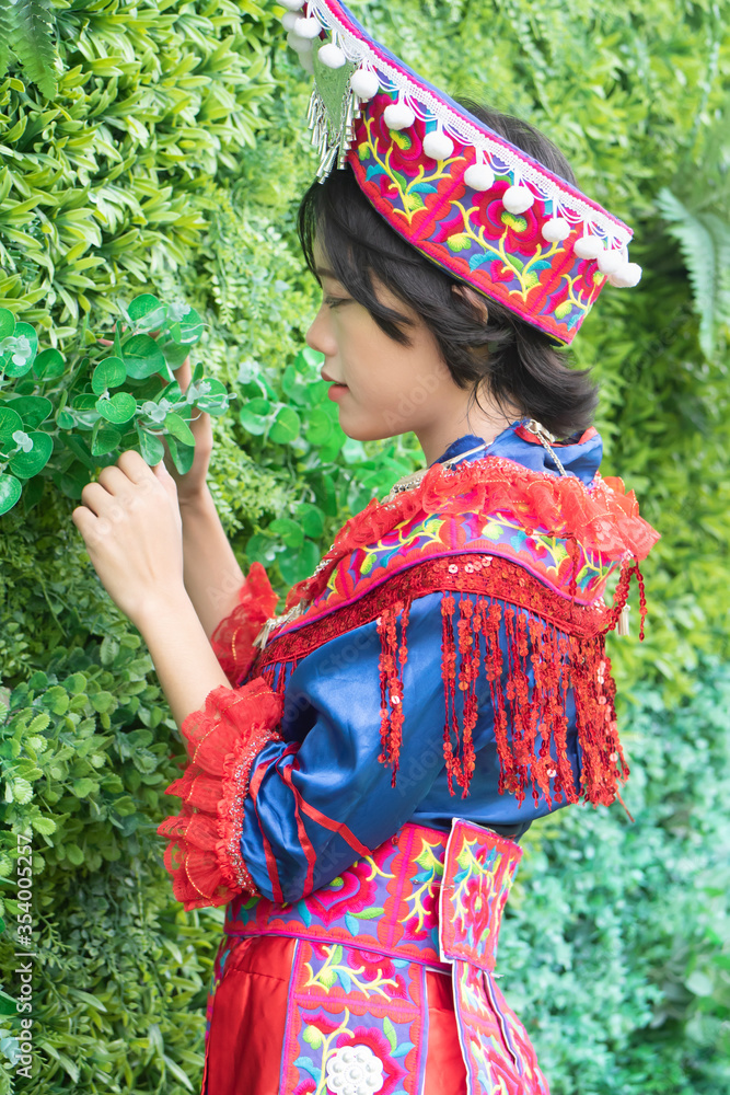 portrait of Hmong young woman in tradition Hmong costume for young girl ...
