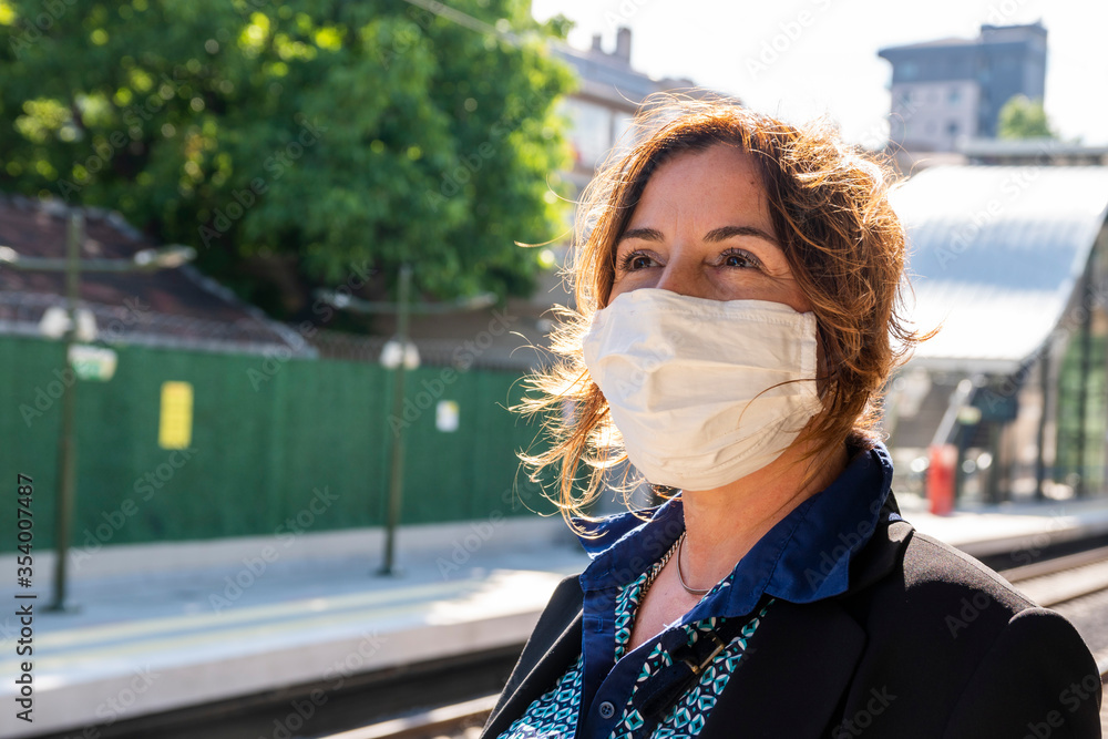 Social distance concept: Young Caucasian female with medical face mask ...