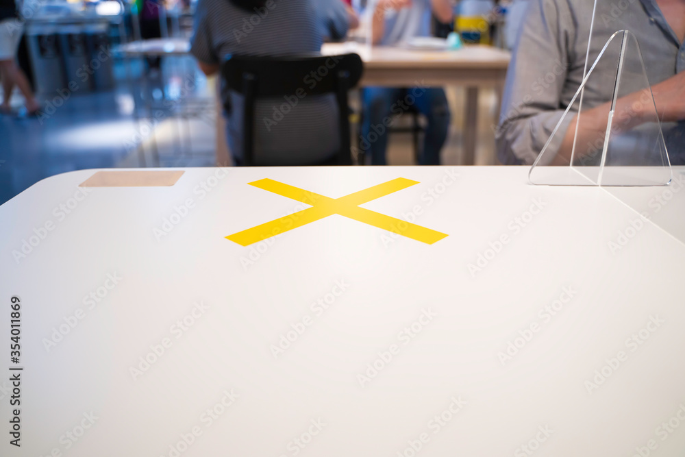 Cross sign stickers mark on table in food court, symbol not allow ...