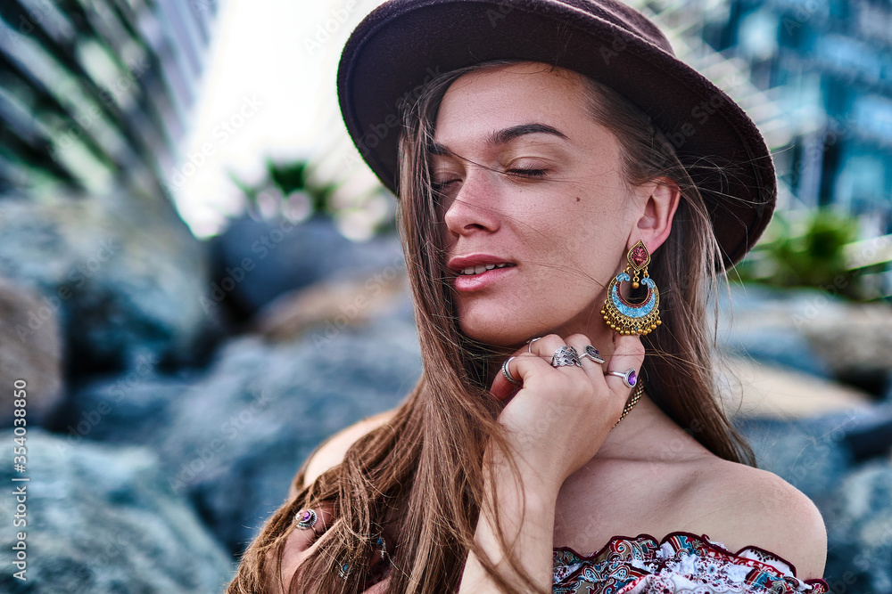 Portrait of beautiful stylish sensual boho chic woman with long hair ...