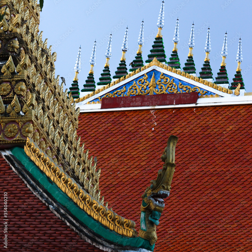 Colorful roof top desgin and architecture of a wat or temple in Siamese ...