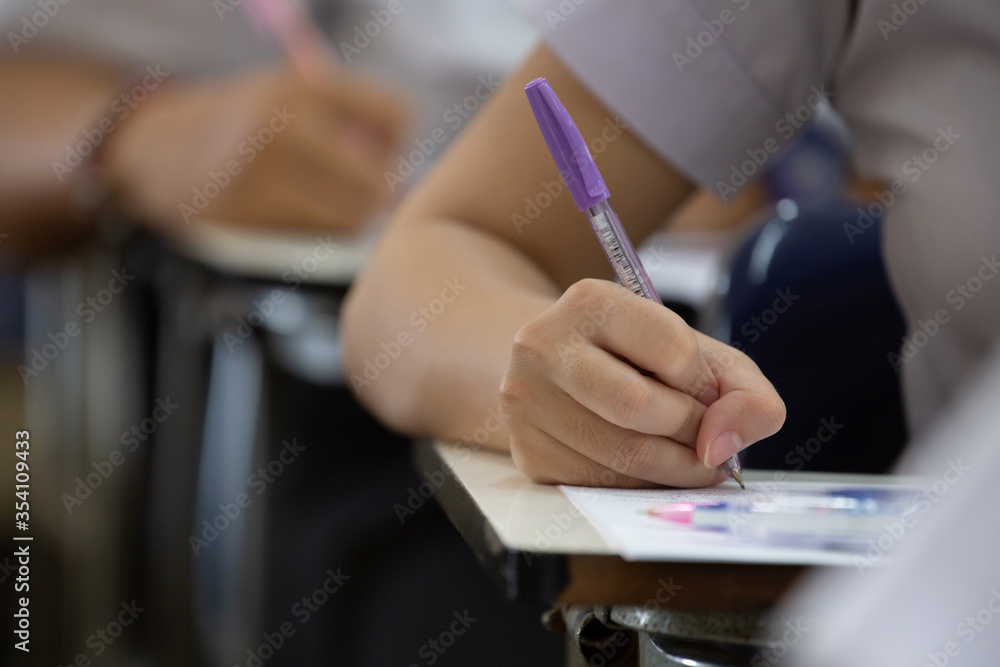high school,university student study.hands holding pencil writing paper ...