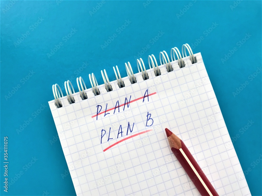 In a spiral notebook in a cell crossed out with a red pencil Plan A ...